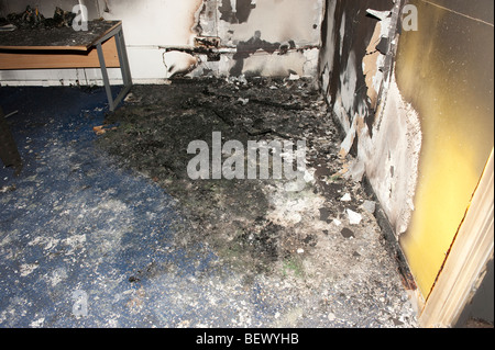 Office fire showing damage and burnt desks Stock Photo - Alamy