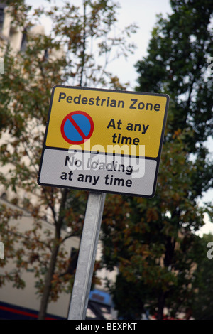 Sign Pedestrian Zone parking restriction At Any Time Stock Photo - Alamy