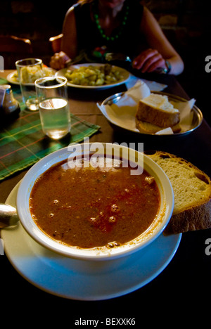 Traditional Hungarian fish soup, halaszle, in a cauldron or bogracs ...