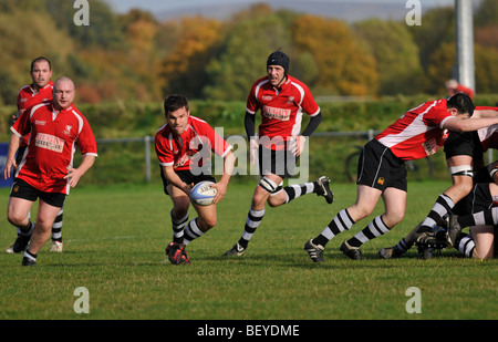 Rugby - scrum half pass the ball from the base of a ruck Stock Photo ...