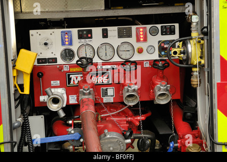 Rear pump locker of fire engine in use with 6 main branches attached ...