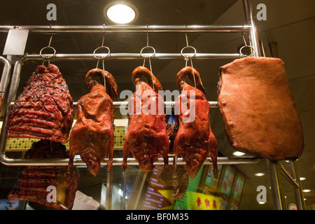 Roast duck hanging in a Chinese restaurant window Stock Photo - Alamy
