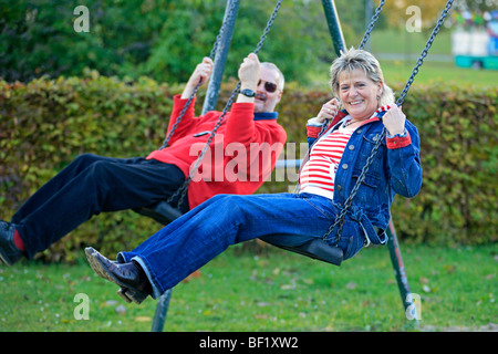 senior citizens playing on a playground together Stock Photo - Alamy