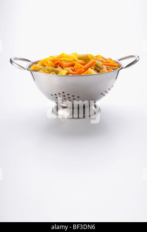 Penne in strainer Stock Photo - Alamy