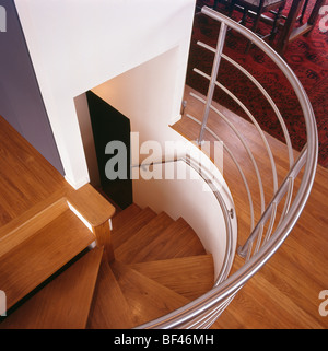 Birdseye view of modern wooden staircase and deckchair on landing Stock ...
