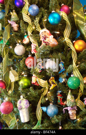 Baubles and string lights decorate a Christmas tree on Kelnskyi ...