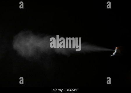 can with a jet of spray coming out Stock Photo - Alamy