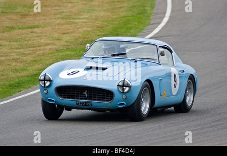 Blue Ferrari 250 GT SWB exclusive classic sports car driven on a street ...