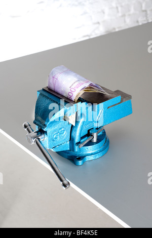 Money and vice, squeezed dry Stock Photo - Alamy