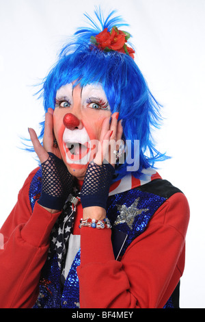 Funny woman clown isolated on the white Stock Photo - Alamy