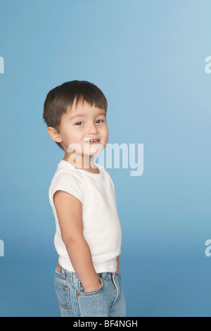 portrait of boy with hands in pockets Stock Photo - Alamy