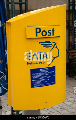 A Greek ELTA Hellenic Post postbox by a beach Stock Photo - Alamy