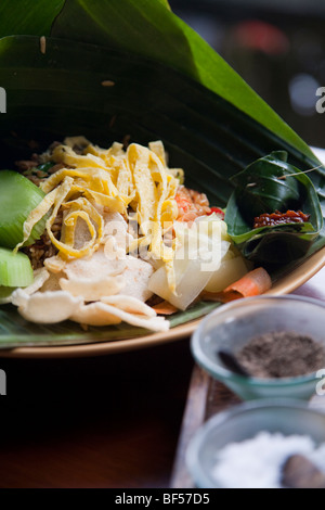 Fresh prepared malaysian fried rice with vegetables on local market on ...