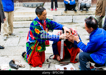 Ritual before Nuo Opera performance, Guizhou Province, China Stock ...