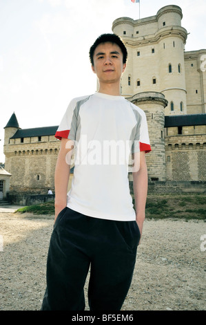 Paris, France, Portrait Young Chinese Man, Crossed arms, tourist ...