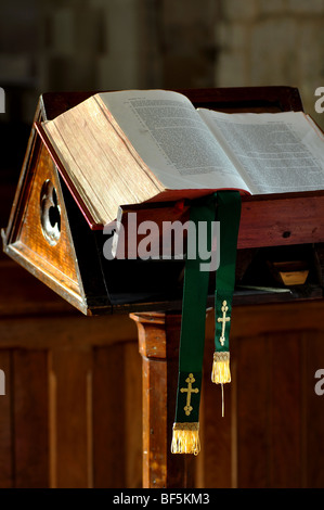 Open bible on lectern, St Mary`s Church, Cubbington, Warwickshire, UK ...