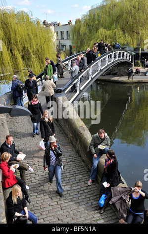 People crossing the Regent's Canal at Camden Lock Market, Camden Town ...