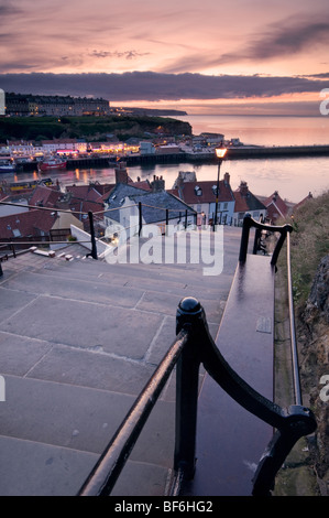 View to Whitby Harbour at sunset from the 199 steps leading from The ...