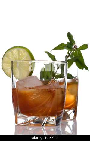 Glass of whiskey with lime and ice. Strong alcohol background Stock ...