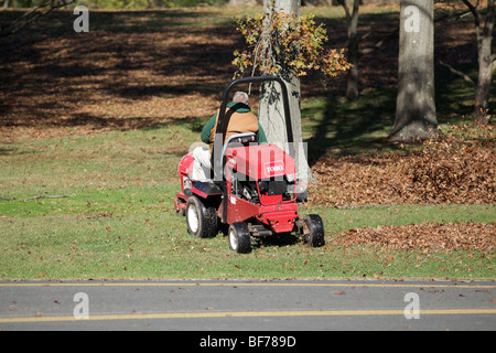 A Toro groundsmaster 328-D fitted with a front power leaf blower ...
