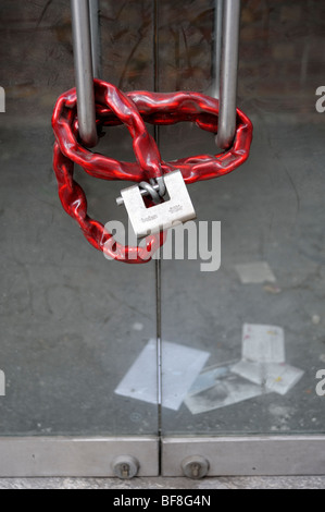 Bankrupt closed down retail shop business with whitewashed windows in a ...