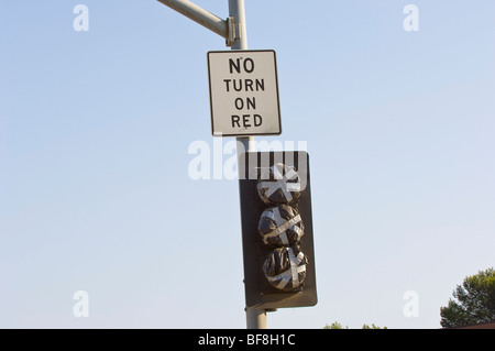 Traffic Light out of order covered orange bag Stock Photo - Alamy