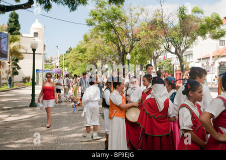 Madeiran children in traditional costume playing musical instruments ...