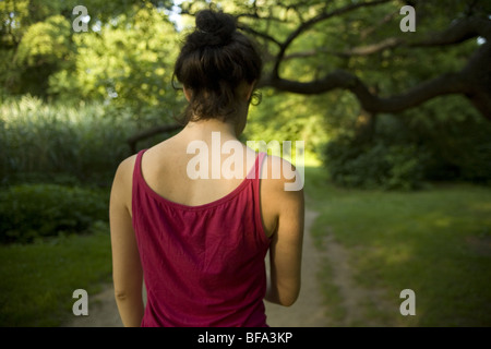 Teenage girl by herself in Prospect Park Brooklyn New York Stock Photo ...