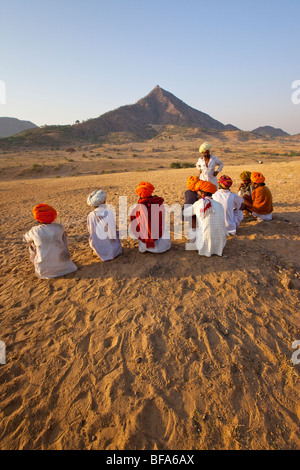 Rajput men in front of the Savitri Hindu Temple at the Camel Fair in ...