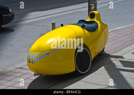 Yellow velomobile, Mango model, seen in the streets of Toronto Stock ...