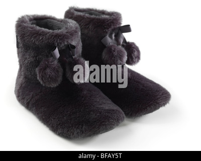 Warm slippers on a white background. Home shoes made of genuine leather ...