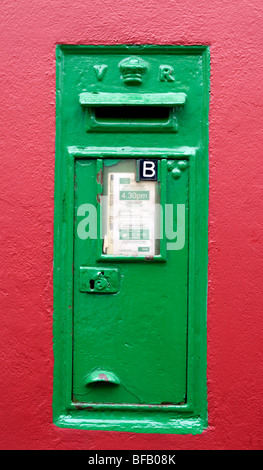 Green victorian letter post box outside Watton Mount Powys County ...