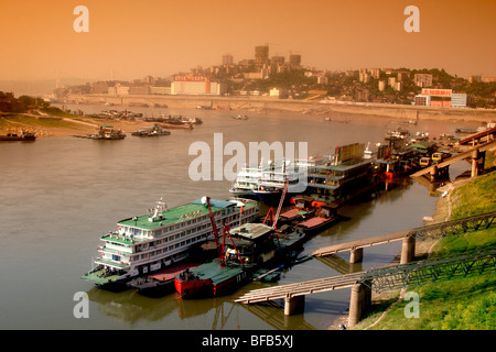 China, Chongqing, pier for Yangzte river cruise ships at night with ...