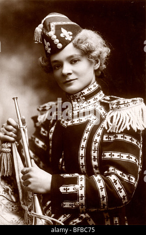 Beautiful blonde woman with old brass telescope, close up portrait ...