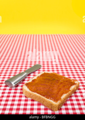 Strawberry jam yellow peach bread with doughnuts Stock Photo - Alamy