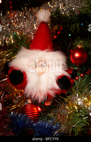 Toy decoration on Christmas tree, closeup Stock Photo - Alamy