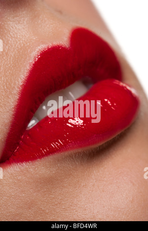 Macro close-up of glossy red calculator AC button with white letters ...