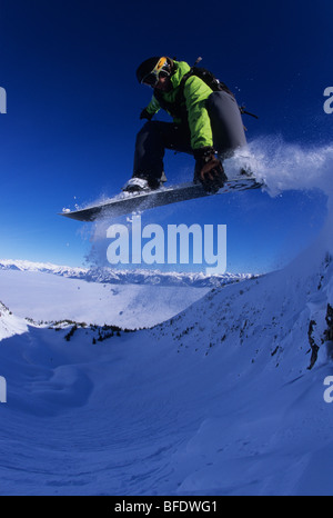 Snowboarder Catching Air Stock Photo - Alamy