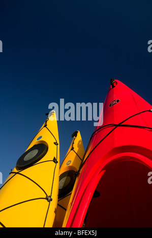 Colorful Kayaks against a blue sky Stock Photo - Alamy