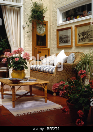 living room with sofas, tables and a small cabinet or shelf Stock Photo ...