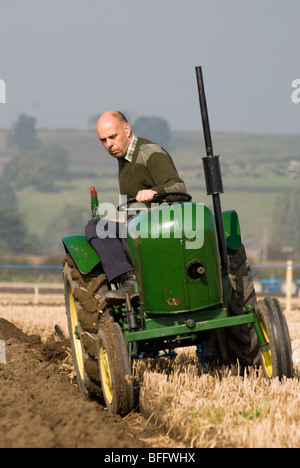 A farmer ploughing with a Crawley 75 vintage tractor, Bulcote ...