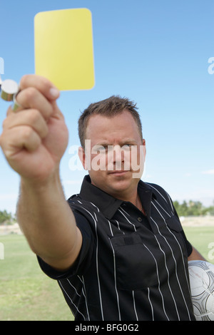 Ref Showing Yellow Card Stock Photo - Alamy