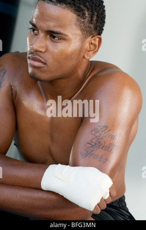 Portrait of boxer with hands taped Stock Photo - Alamy