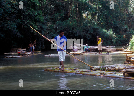 Jamaican man, adult man, tour guide, tourists, couple, bamboo raft ...