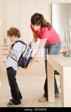 Boy is checking his weight Stock Photo - Alamy