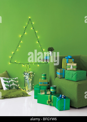 Baubles and string lights decorate a Christmas tree on Kelnskyi ...