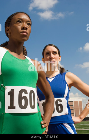 Two female track athletes Stock Photo - Alamy