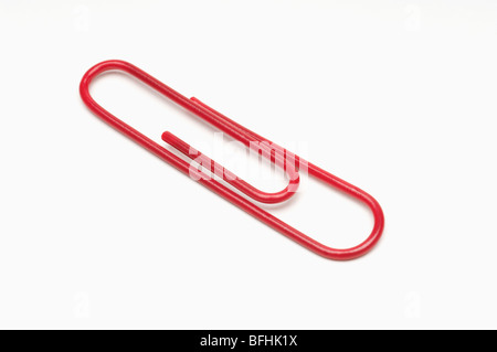 red paper clip on white background Stock Photo - Alamy