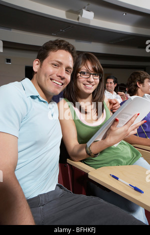 Two students working in class, portrait Stock Photo - Alamy