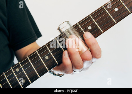 playing a slide guitar Stock Photo - Alamy